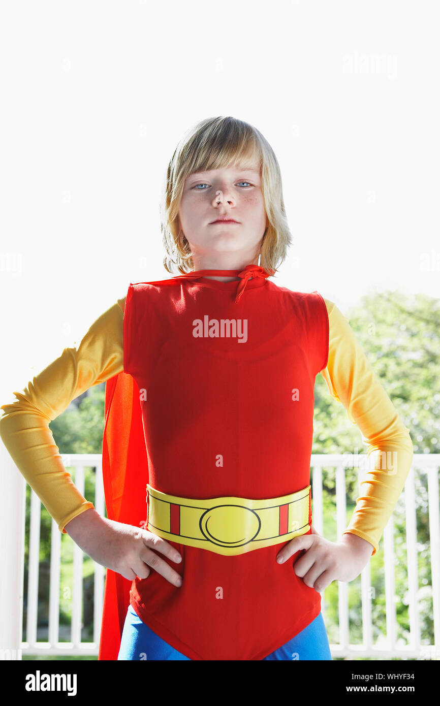 Portrait of a serious young boy in superhero costume indoors Stock ...