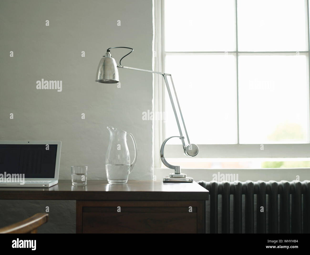Closeup view of a study desk with laptop and lamp Stock Photo - Alamy