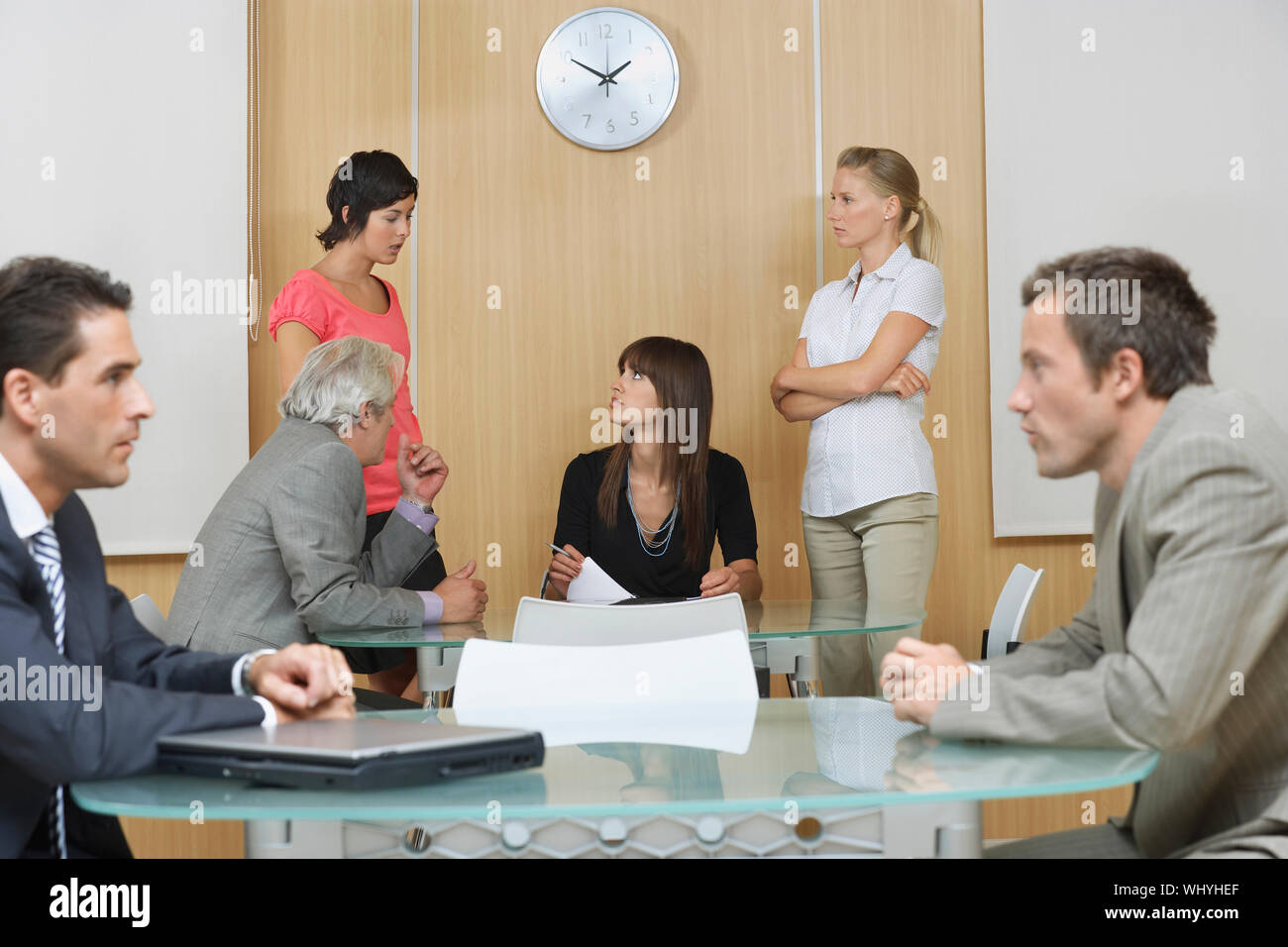 Two groups of businesspeople having meetings in conference room Stock ...