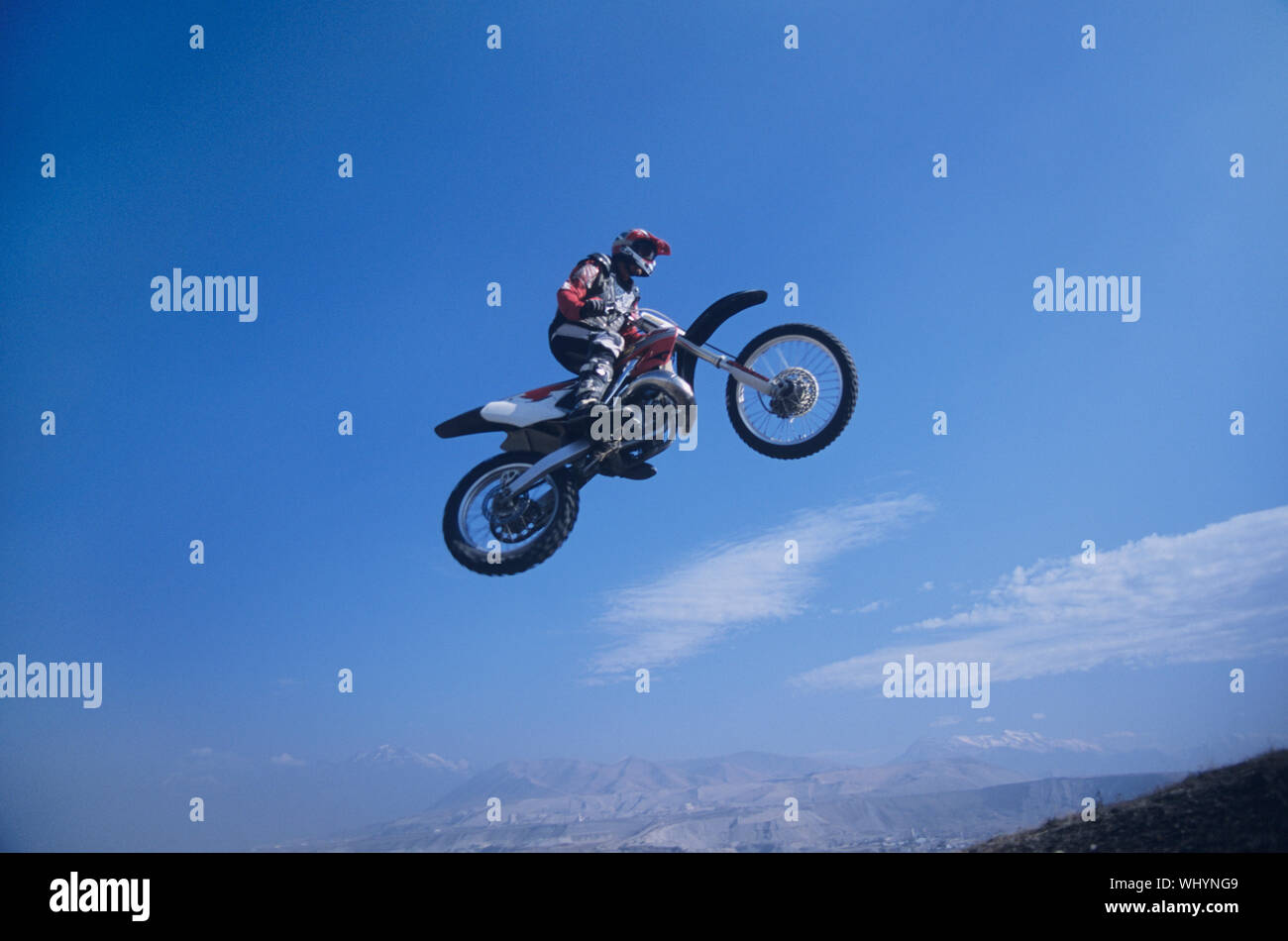 Low angle view sportsman jumping hi-res stock photography and images ...