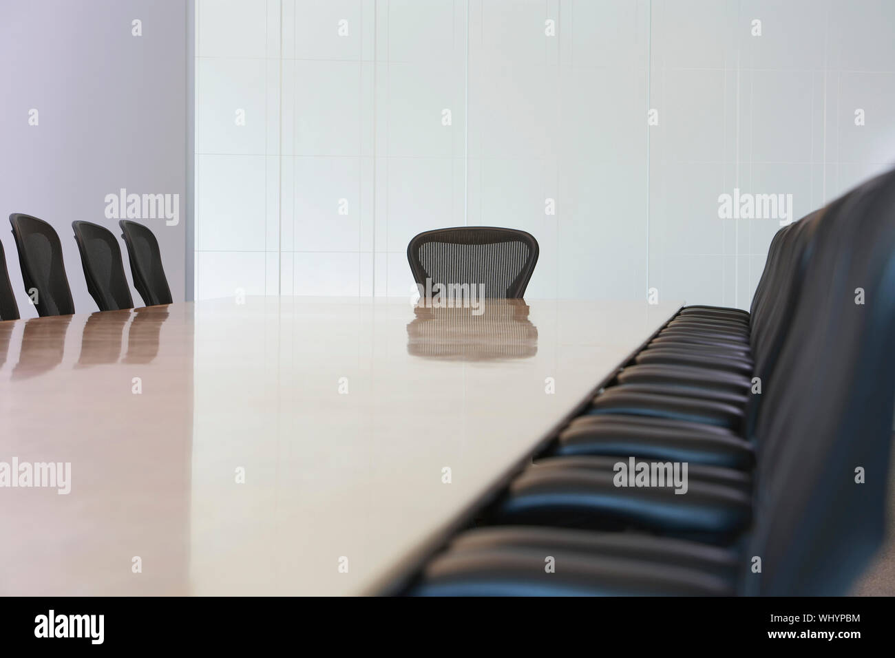 View of an empty boardroom with seats Stock Photo - Alamy