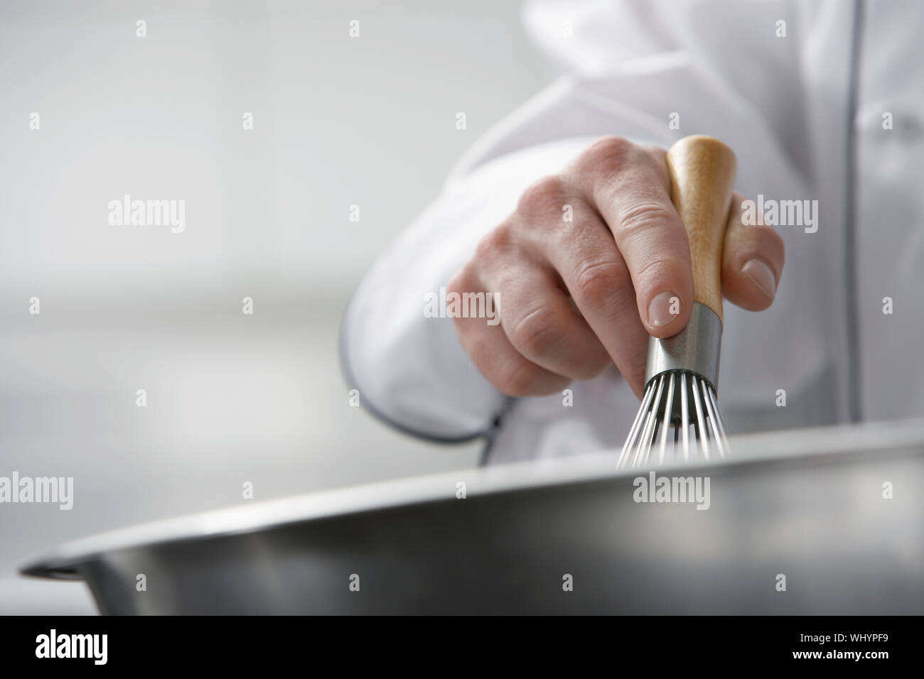 Professional chef whisking ingredients hi-res stock photography and ...