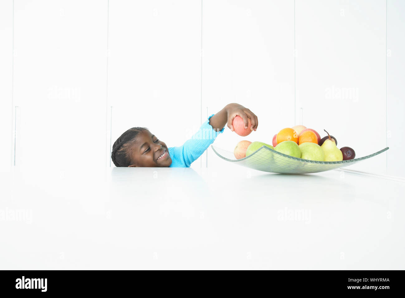 African American Table Reaching High Resolution Stock Photography and ...