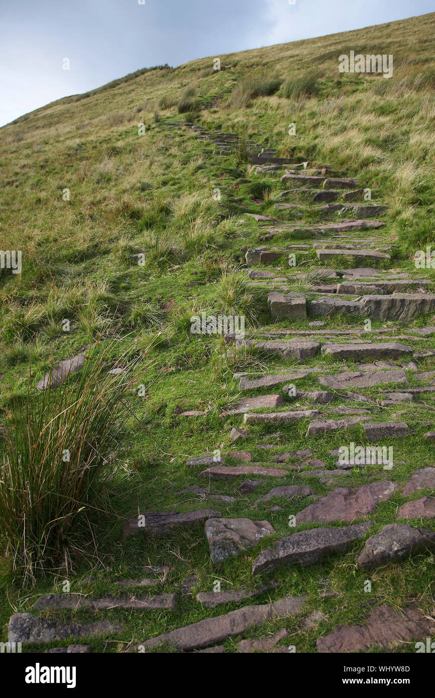 Stone path leading up hill Stock Photo - Alamy