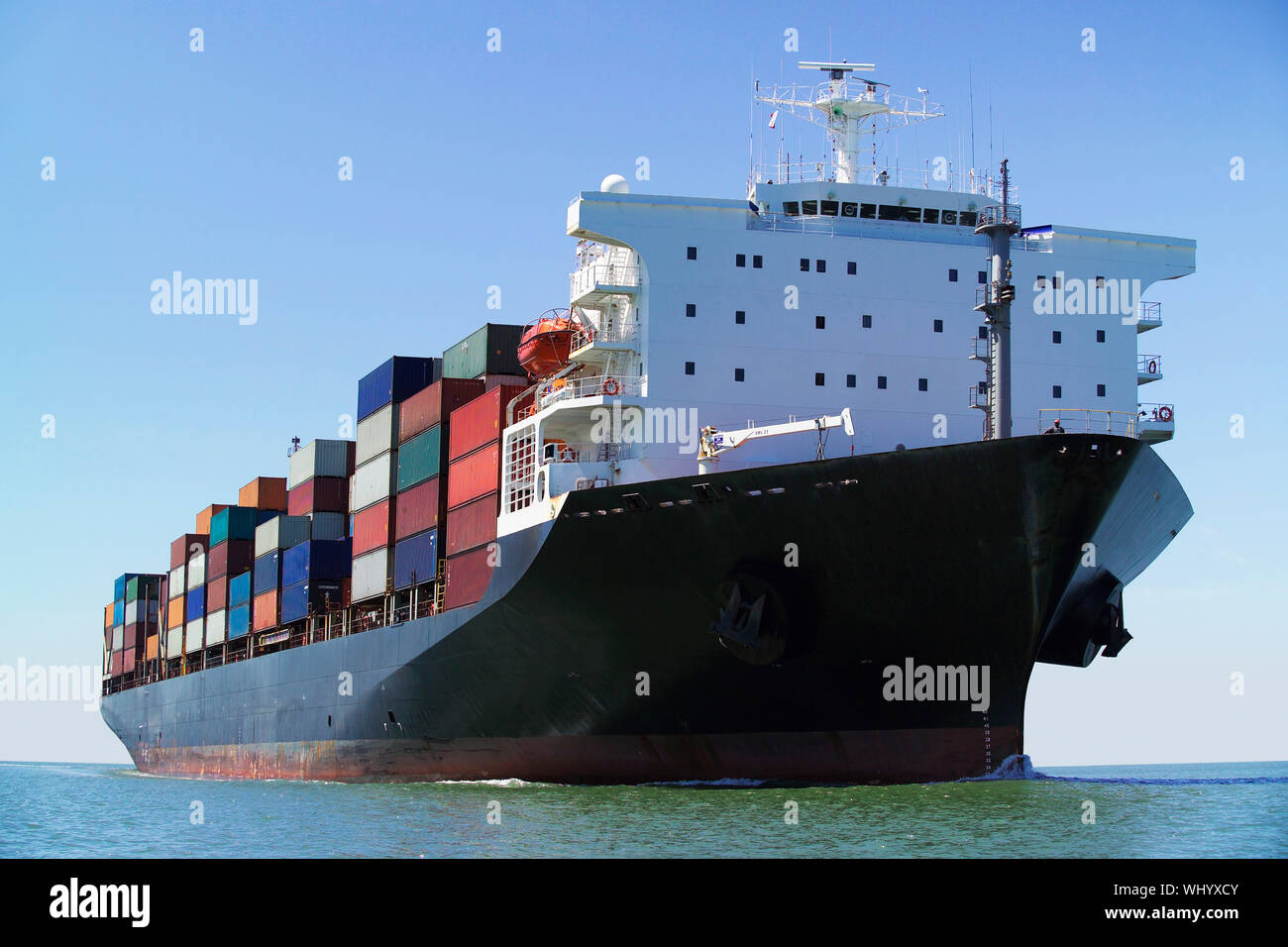 Container ship on ocean Stock Photo - Alamy