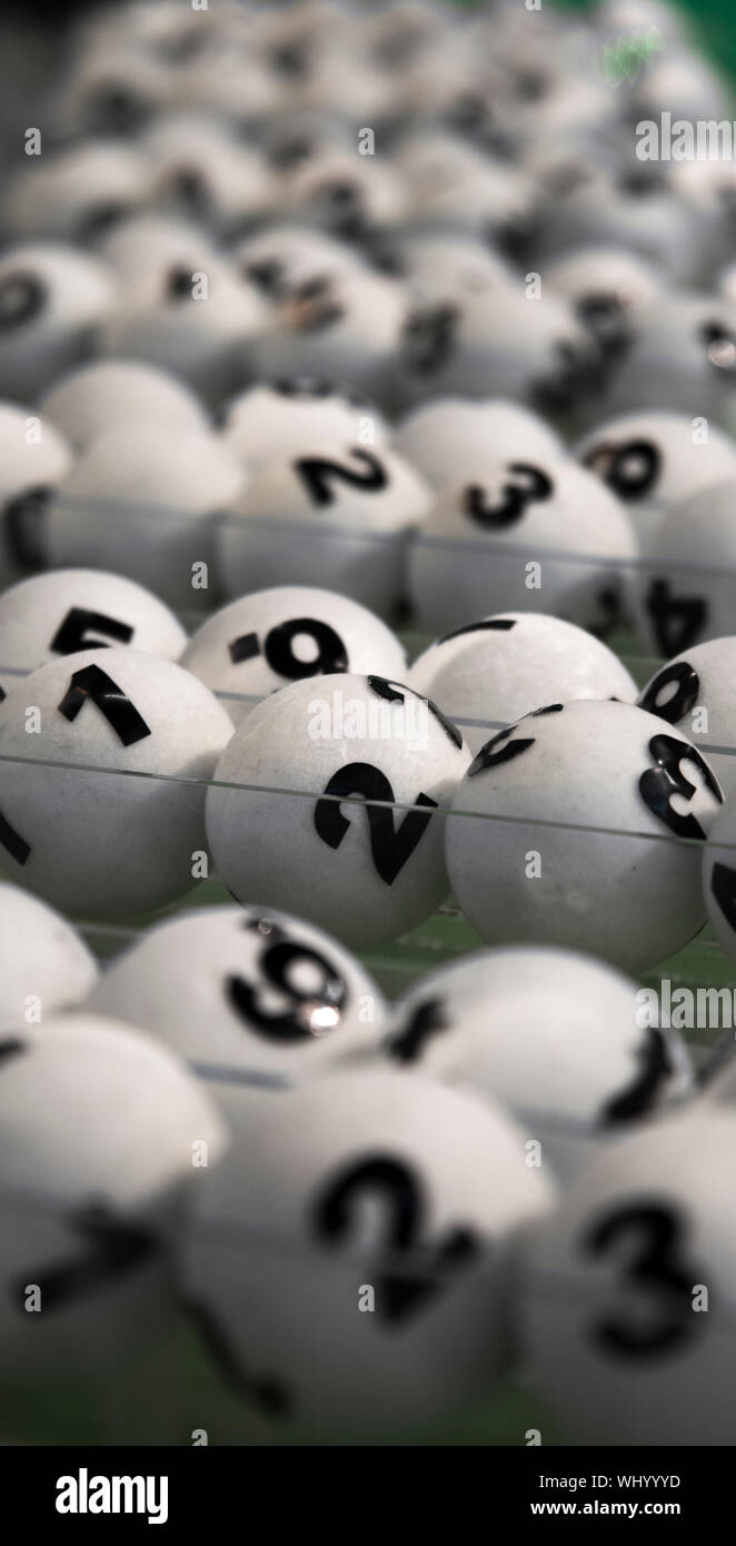 white balls with numbers for the game of lottery Stock Photo - Alamy