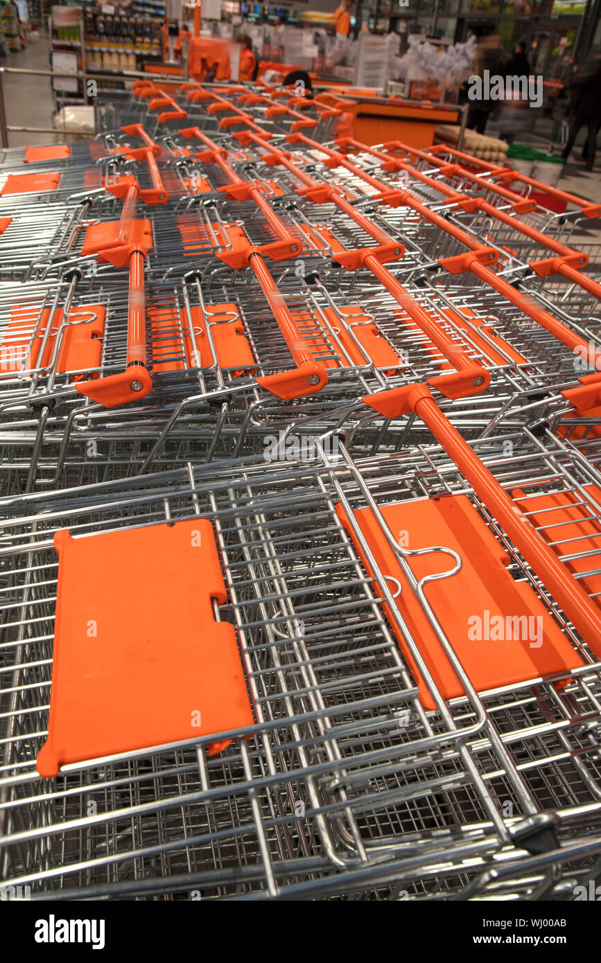 shopping carts in a store stand in a row Stock Photo - Alamy