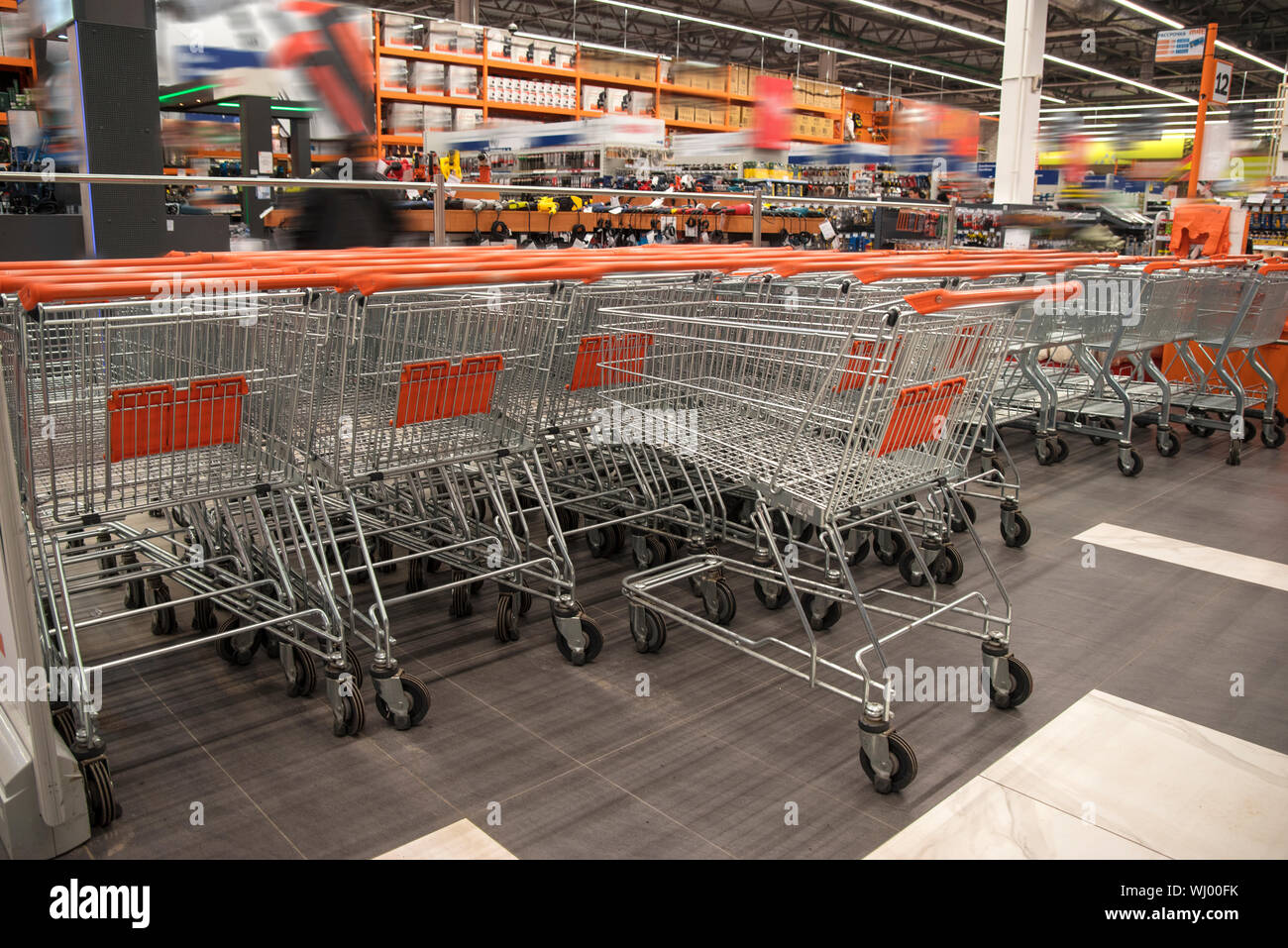 shopping carts in a store stand in a row Stock Photo - Alamy