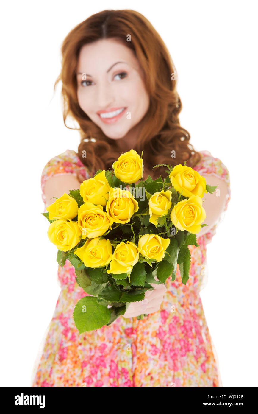 Attractive casual woman with yellow roses. Isolated on white Stock ...