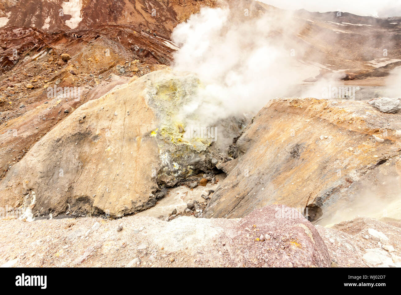 Steaming, sulfuric, active fumaroles near Volcano Mutnovsky, Kamchatka ...
