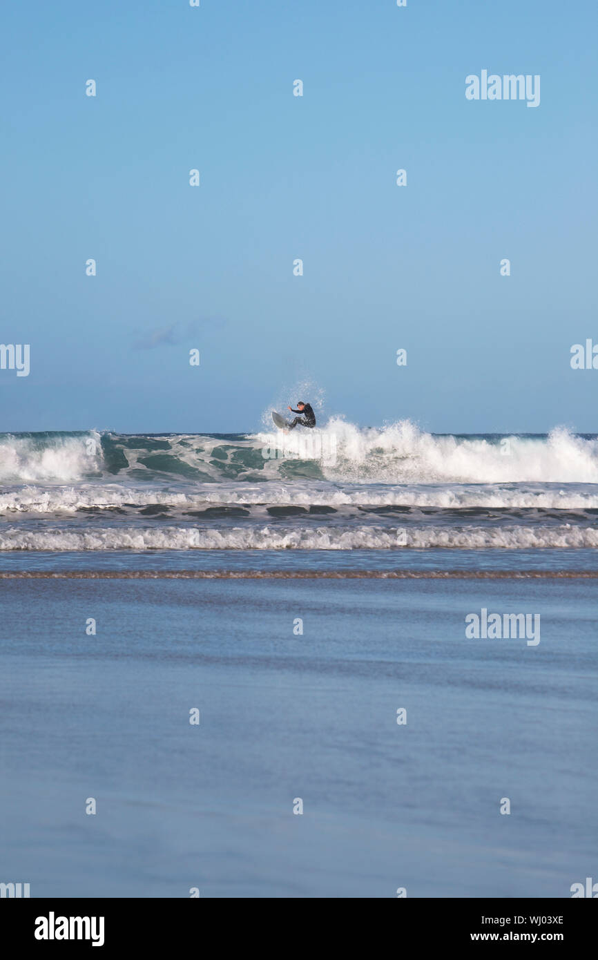 Man surfing waves Stock Photo - Alamy