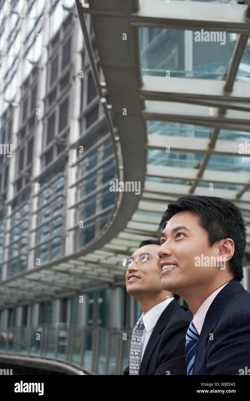 Side view happy businessmen hi-res stock photography and images - Alamy