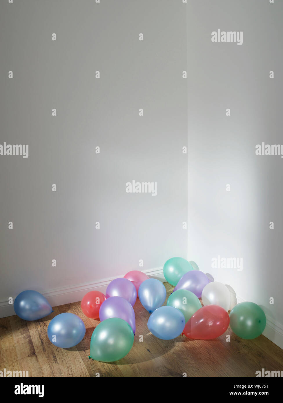 Party Balloons in a Corner Stock Photo - Alamy
