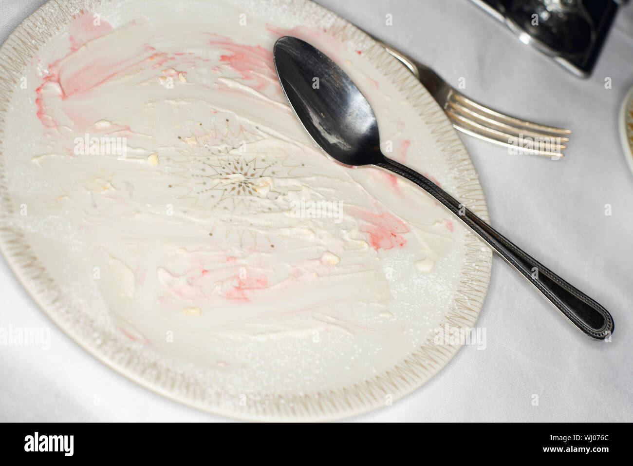 Dirty Plate and Silverware Stock Photo - Alamy