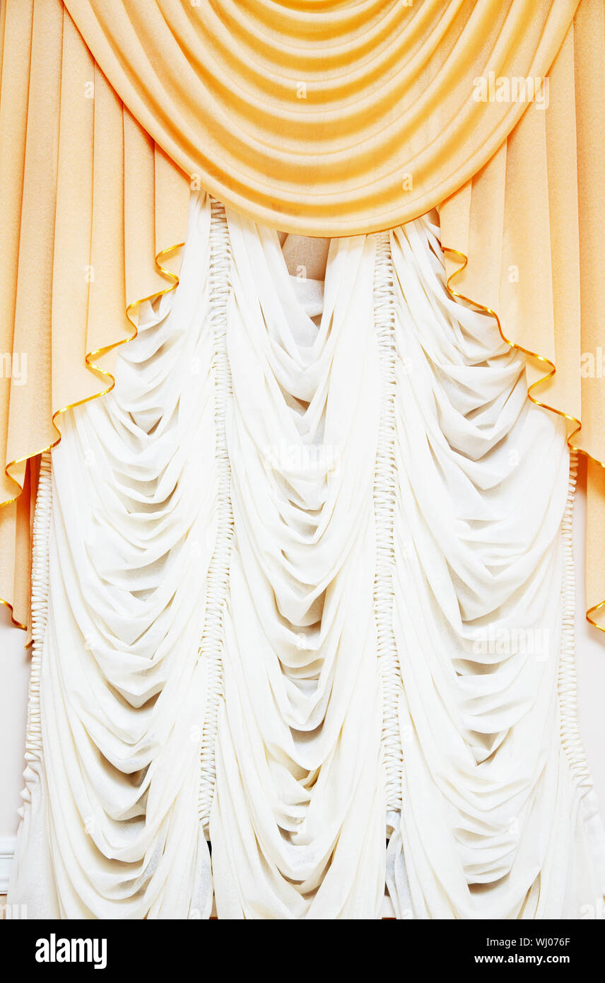 Beautiful, classic curtains on the big window in the interior Stock ...