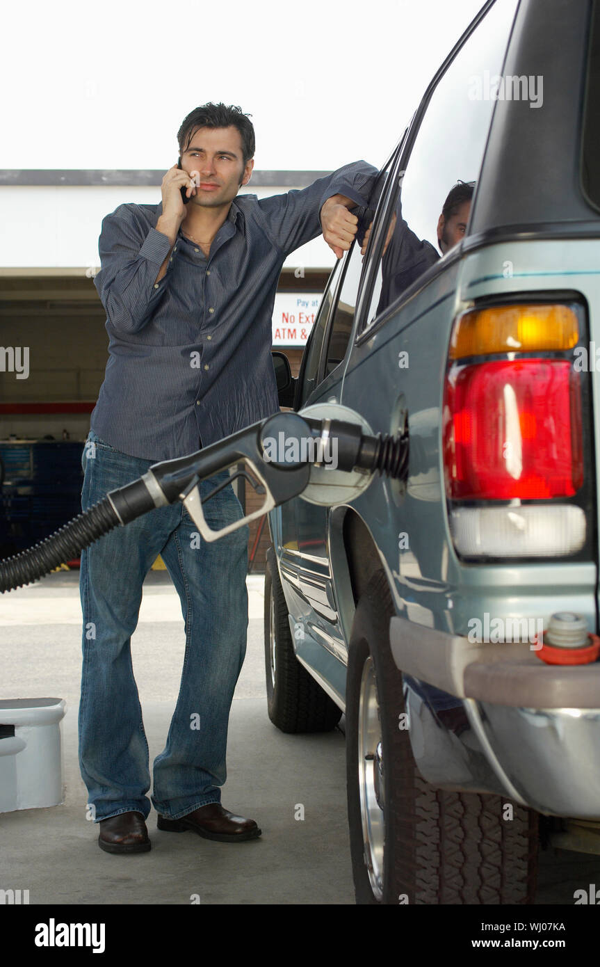 Man filling van with fuel hi-res stock photography and images - Alamy