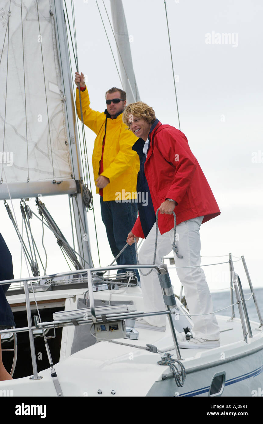 Two men on yacht Stock Photo - Alamy
