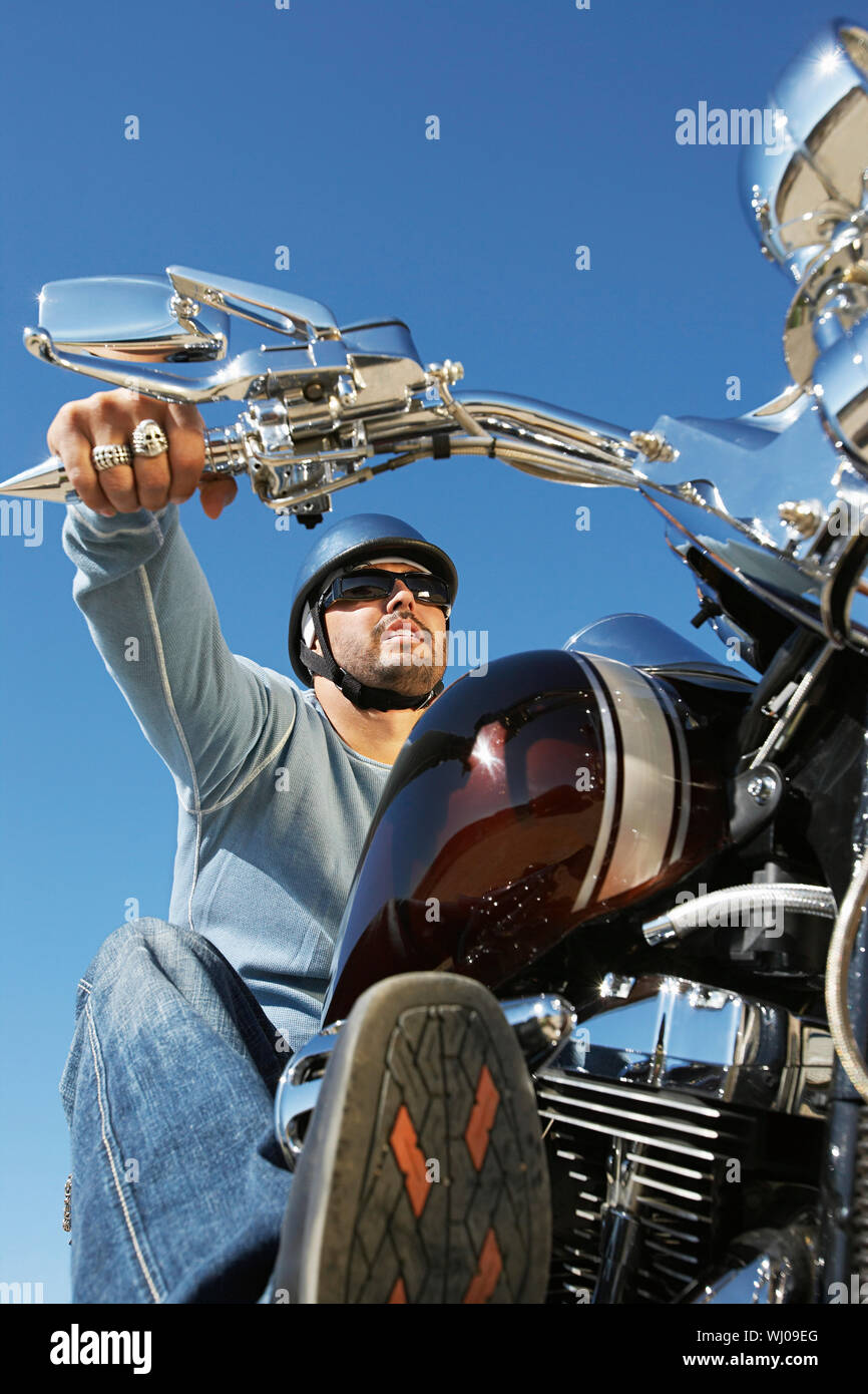 Biker riding motorcycle low angle hi-res stock photography and images ...