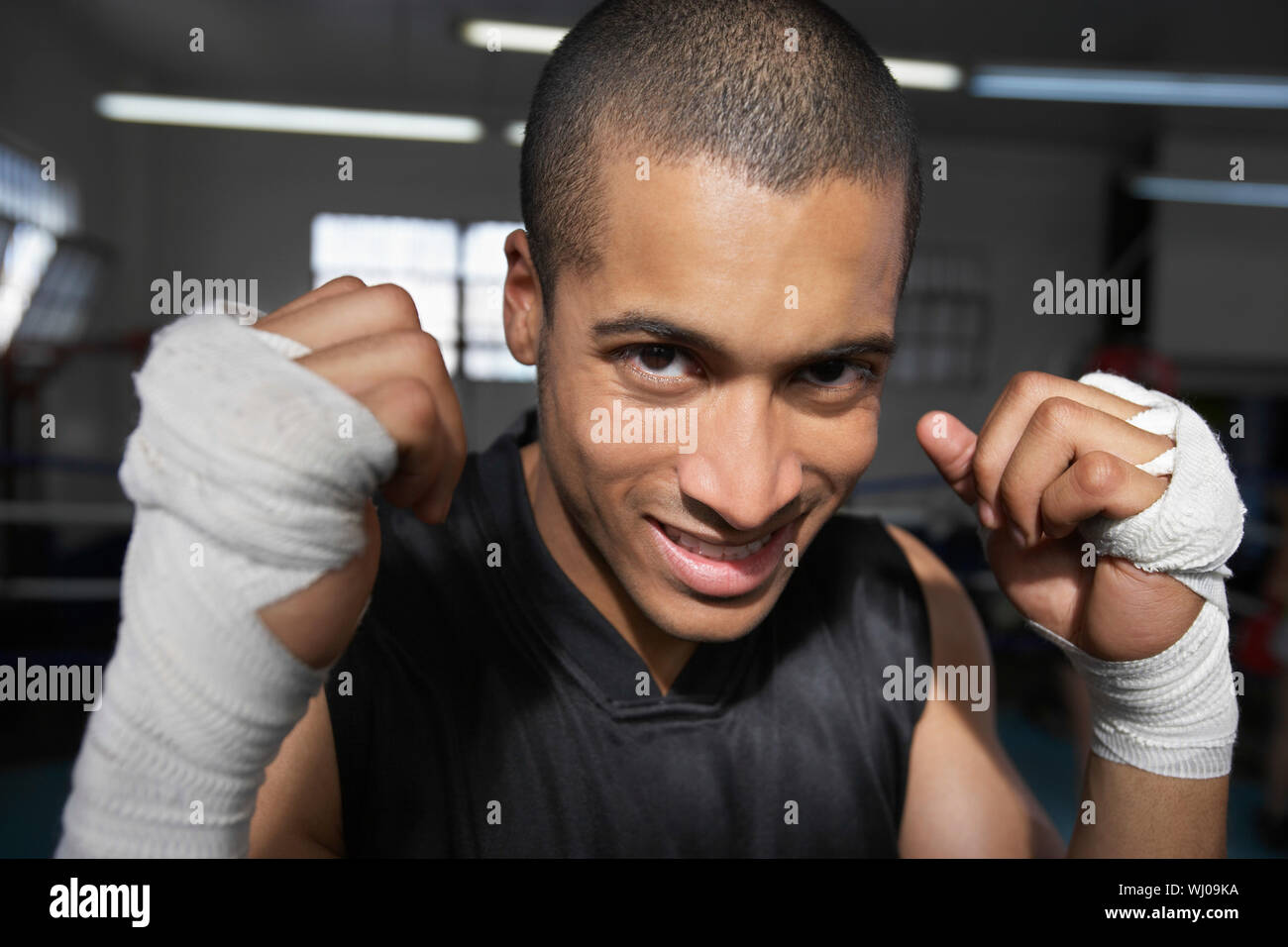 Closeup portrait of male boxer smiling Stock Photo - Alamy