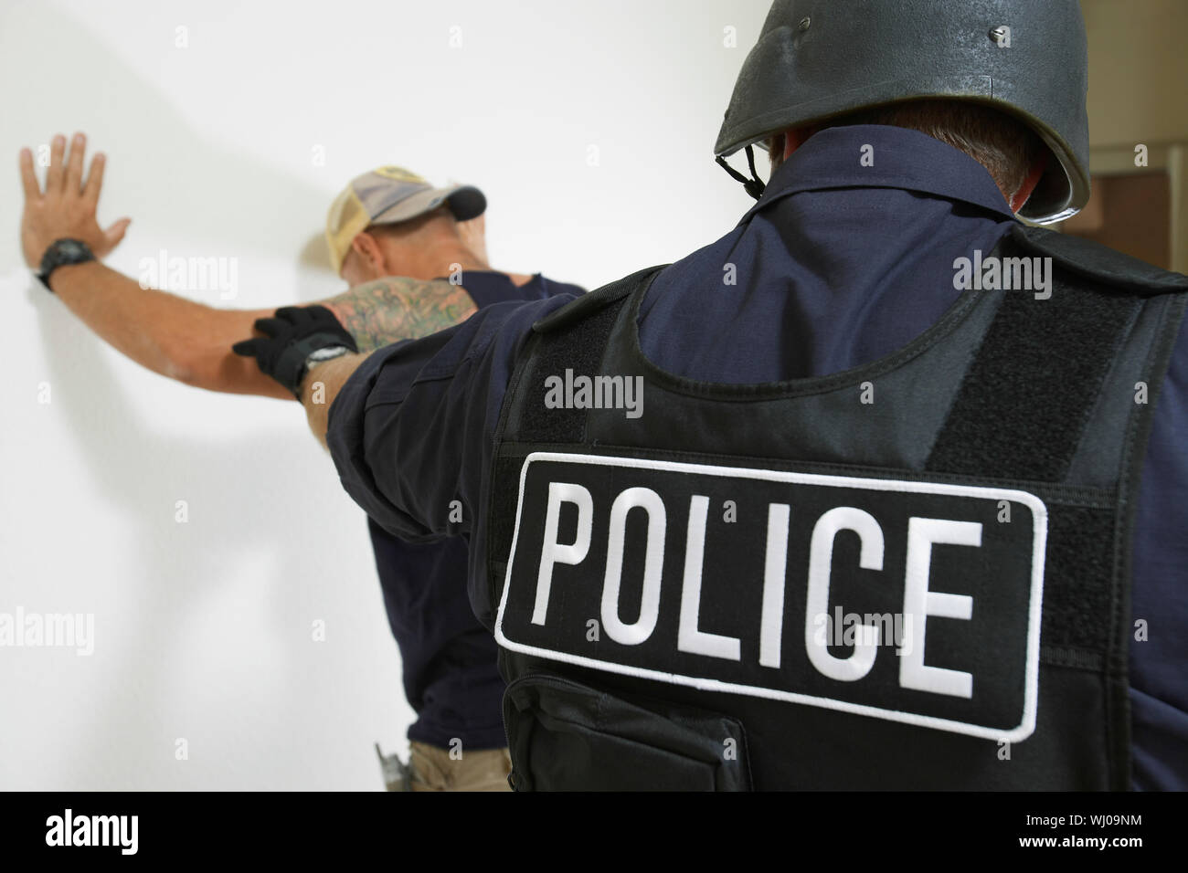 Policeman helmet rear view hi-res stock photography and images - Alamy