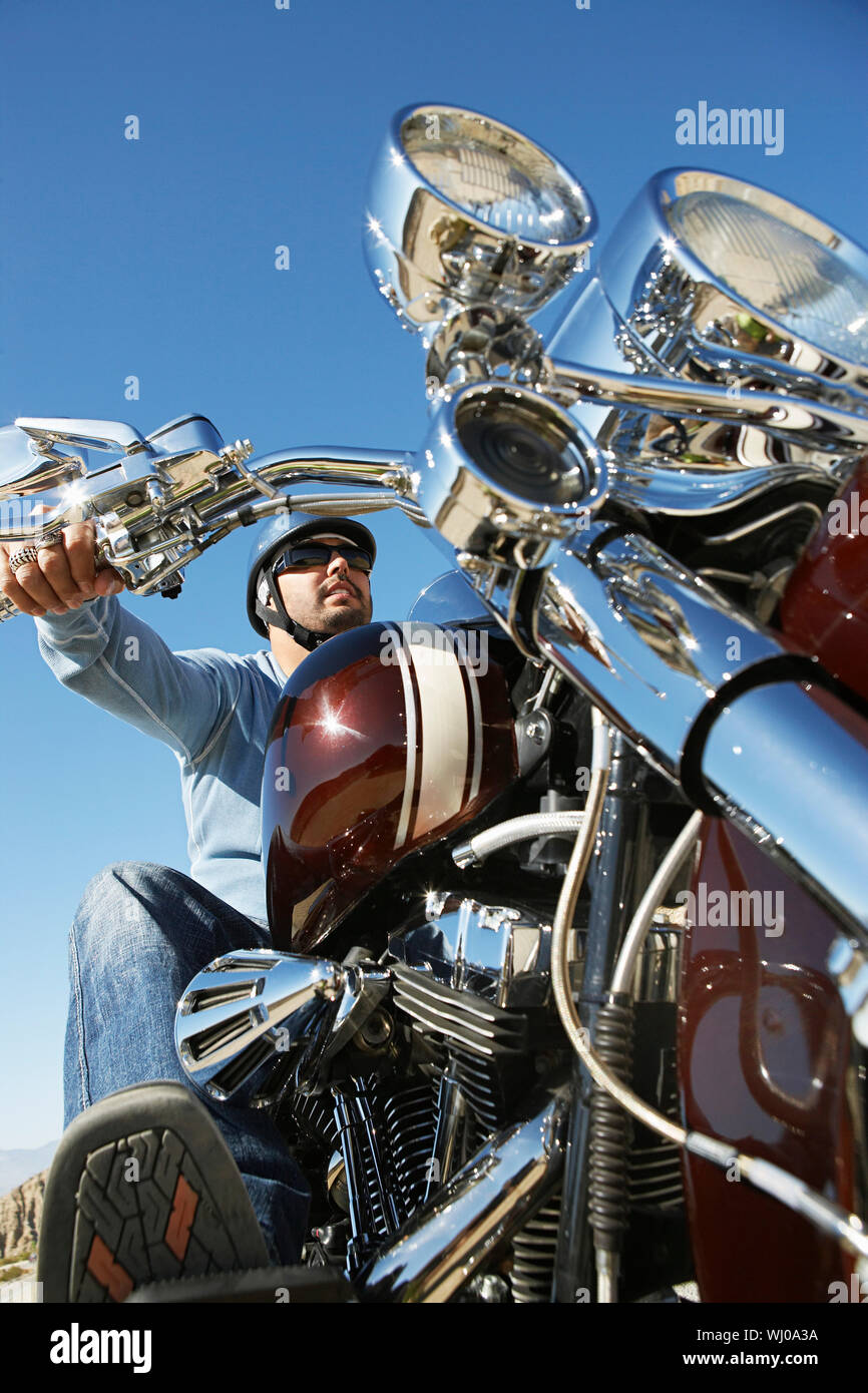 Biker riding motorcycle low angle hi-res stock photography and images ...
