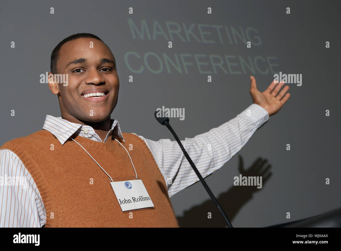 Business man giving presentation at conference meeting, portrait Stock ...