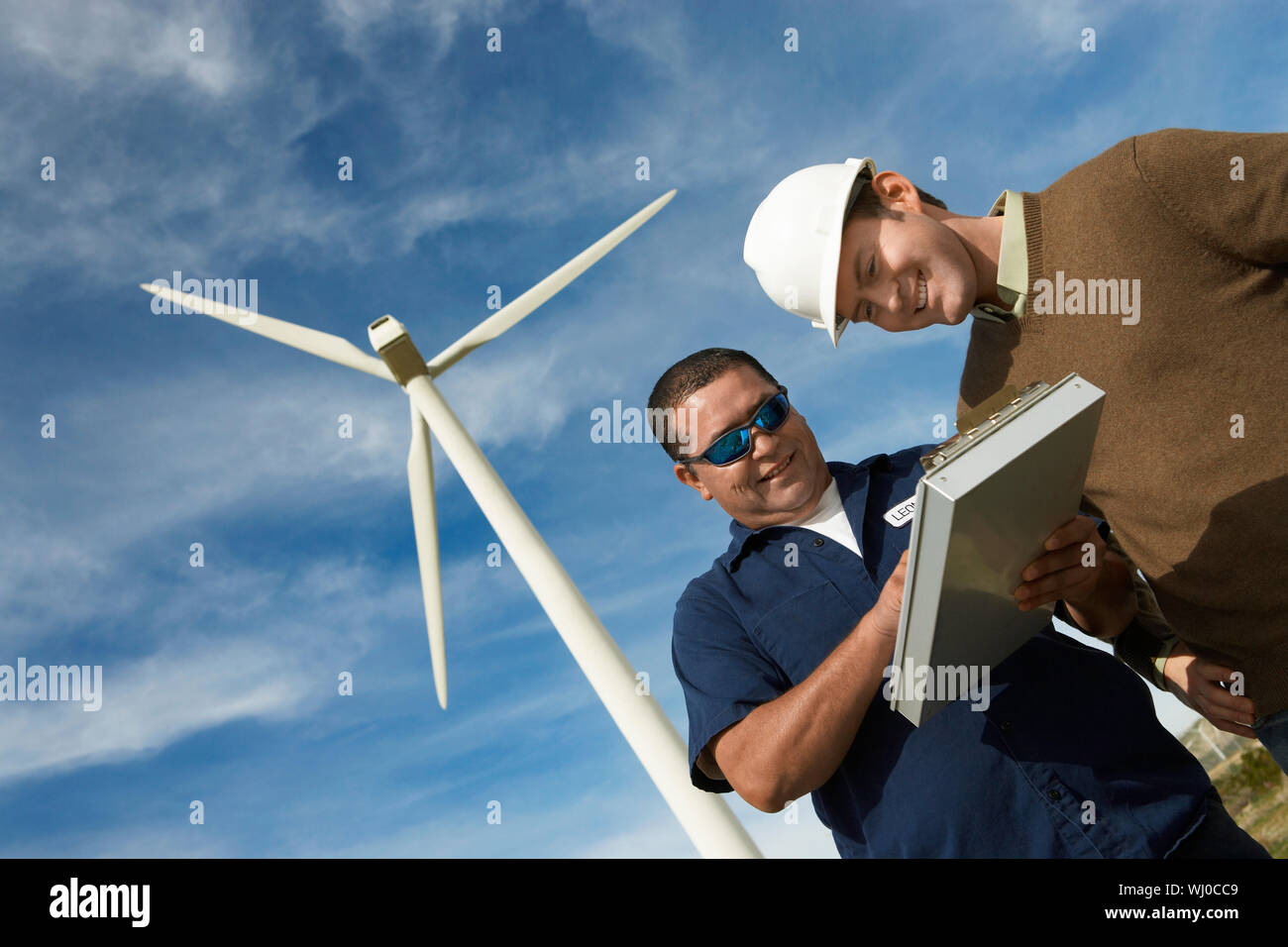 Engineers working at wind farm Stock Photo - Alamy