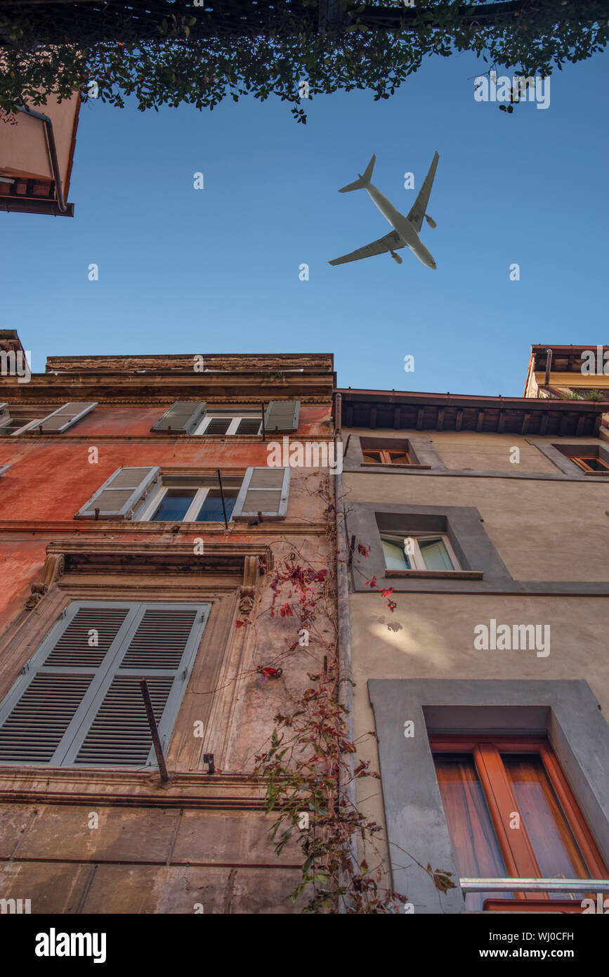 the plane flies over the ancient streets of Rome Stock Photo - Alamy