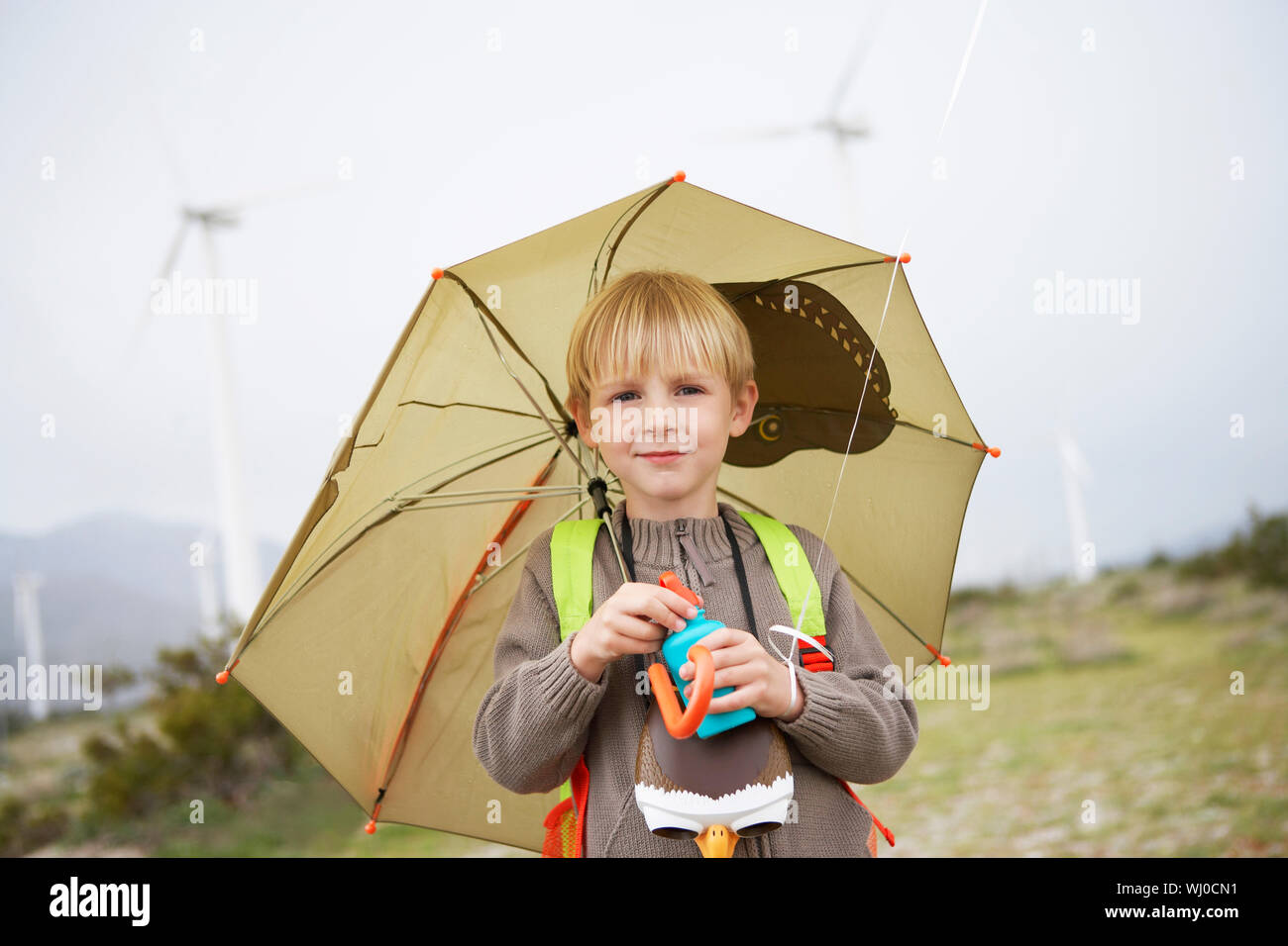 Child wind umbrella hi-res stock photography and images - Alamy