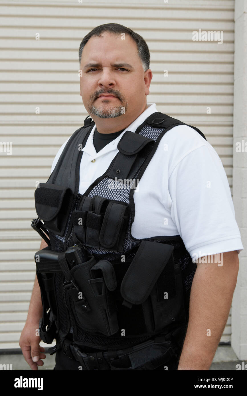 Portrait of security guard in bulletproof vest Stock Photo - Alamy
