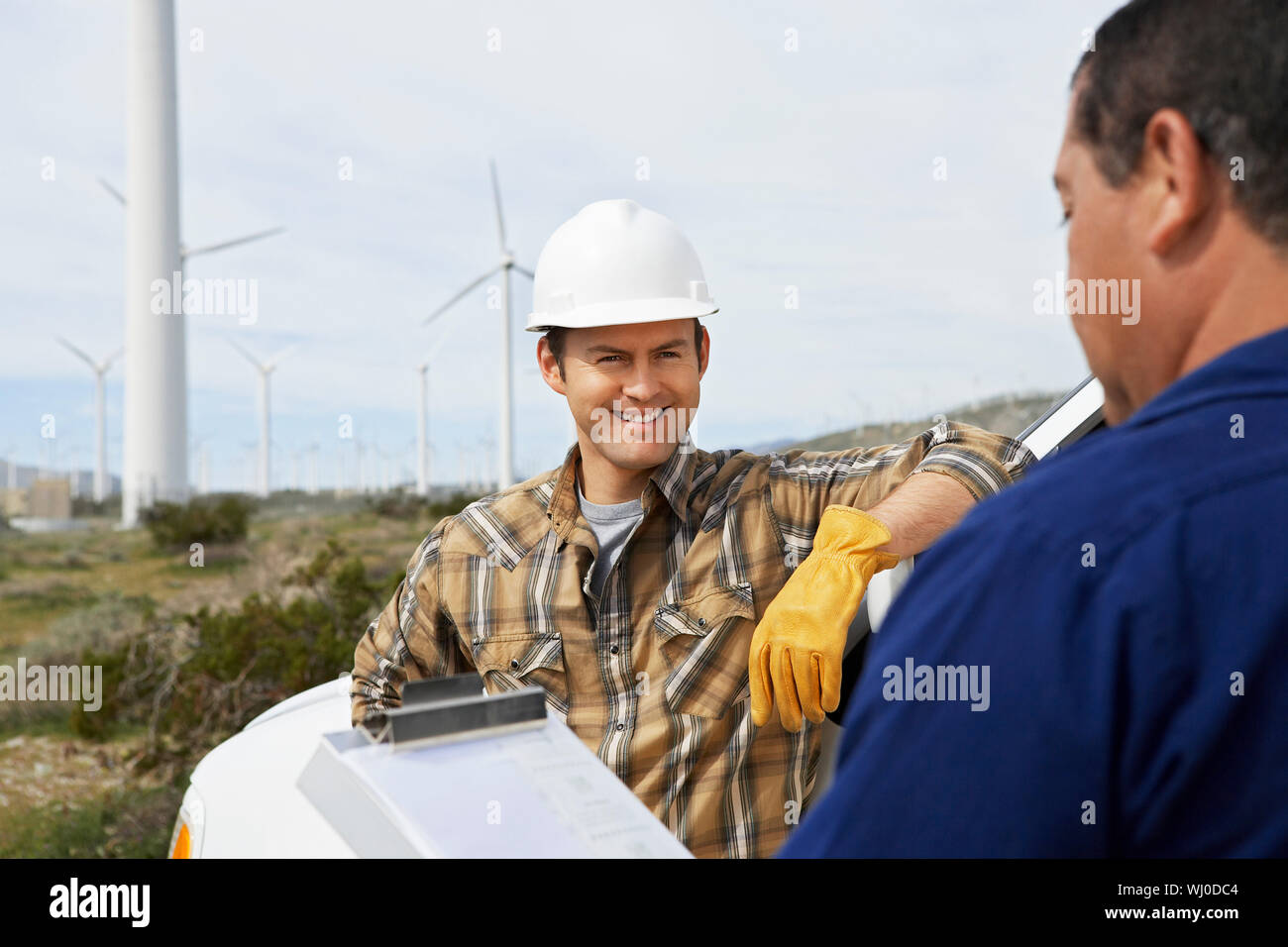 Two engineers wind turbines hi-res stock photography and images - Alamy