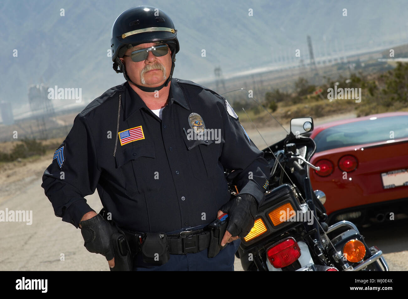 Portrait of traffic cop on road Stock Photo - Alamy