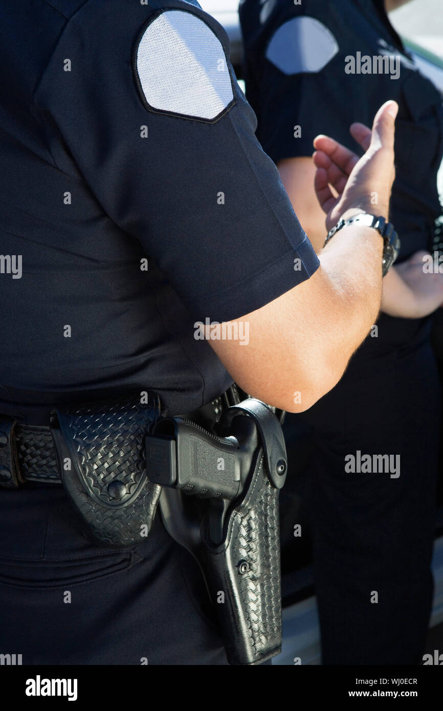Hispanic man male security guard gun hi-res stock photography and ...