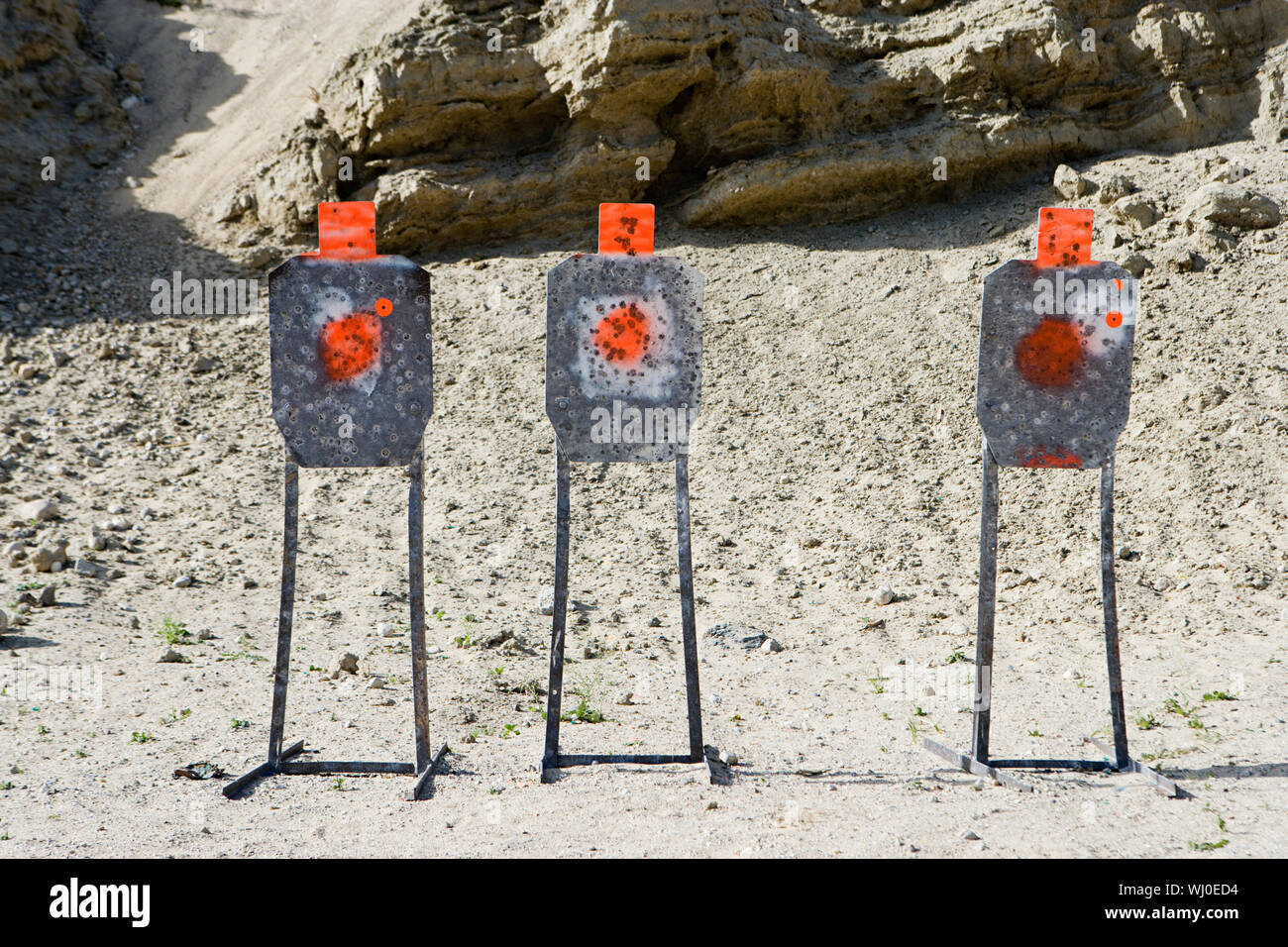 Three targets with bullet holes at firing range Stock Photo - Alamy