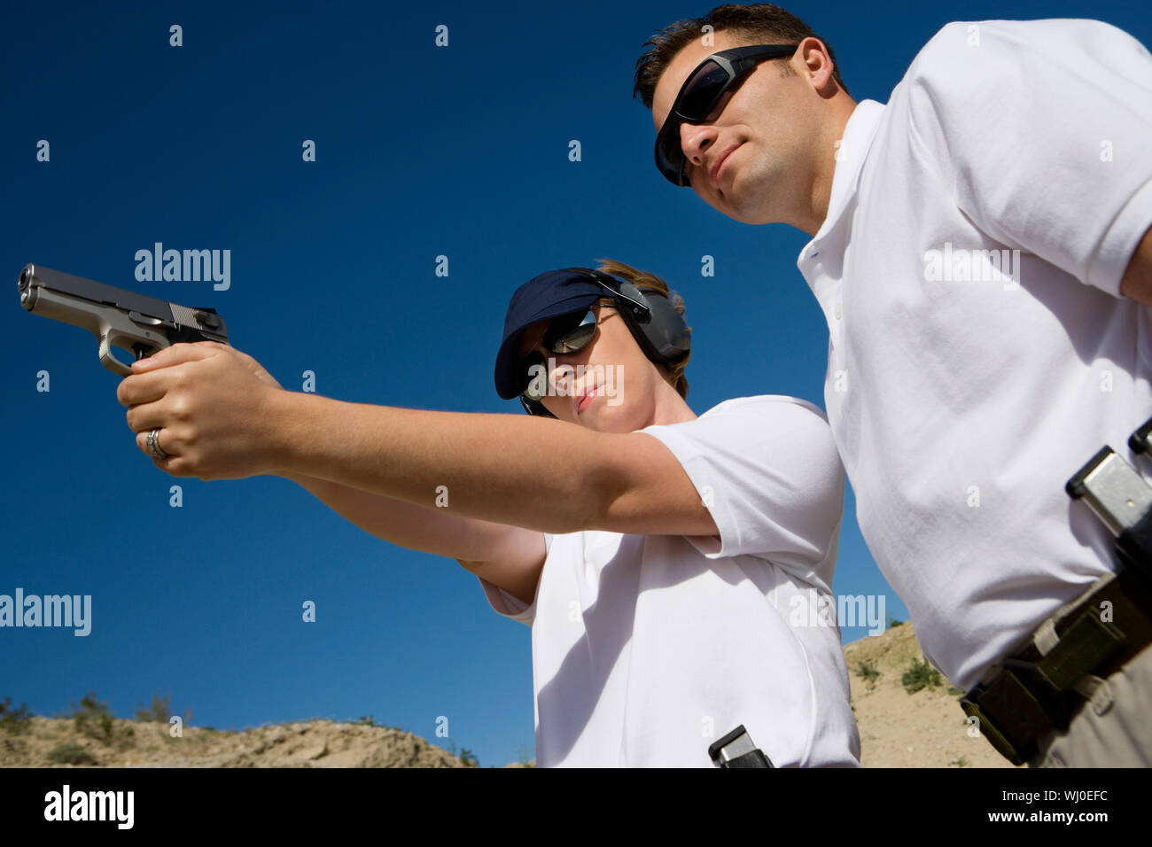 Learning pistol firing hi-res stock photography and images - Alamy