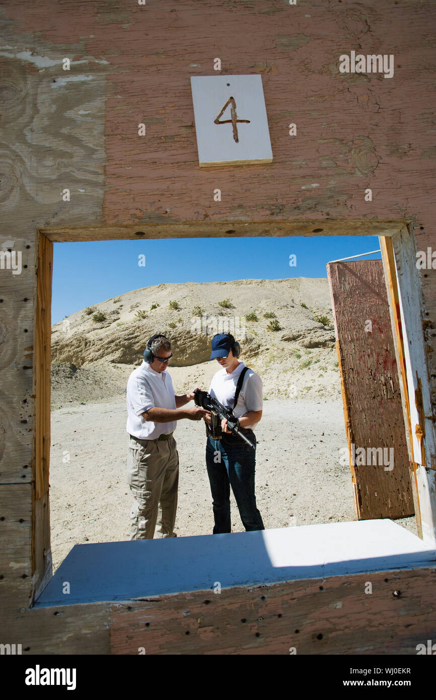 Woman loading gun hi-res stock photography and images - Alamy