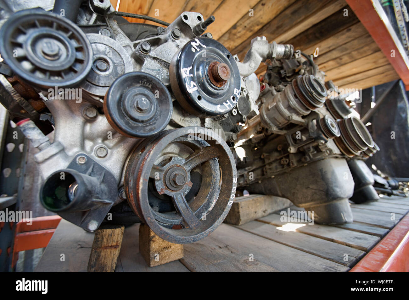 Car engines in junkyard Stock Photo - Alamy