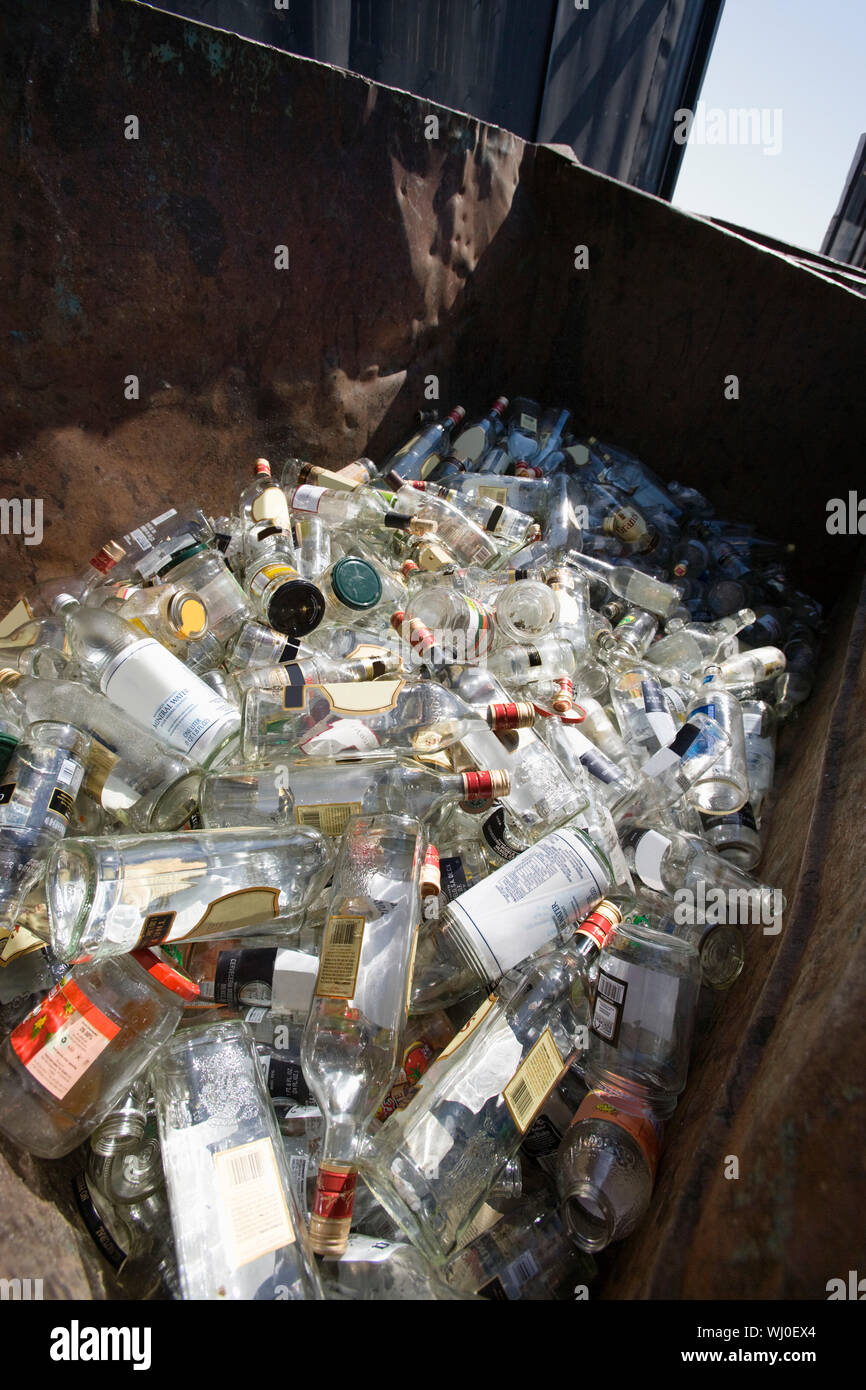 Pile of glass bottles in bin Stock Photo - Alamy