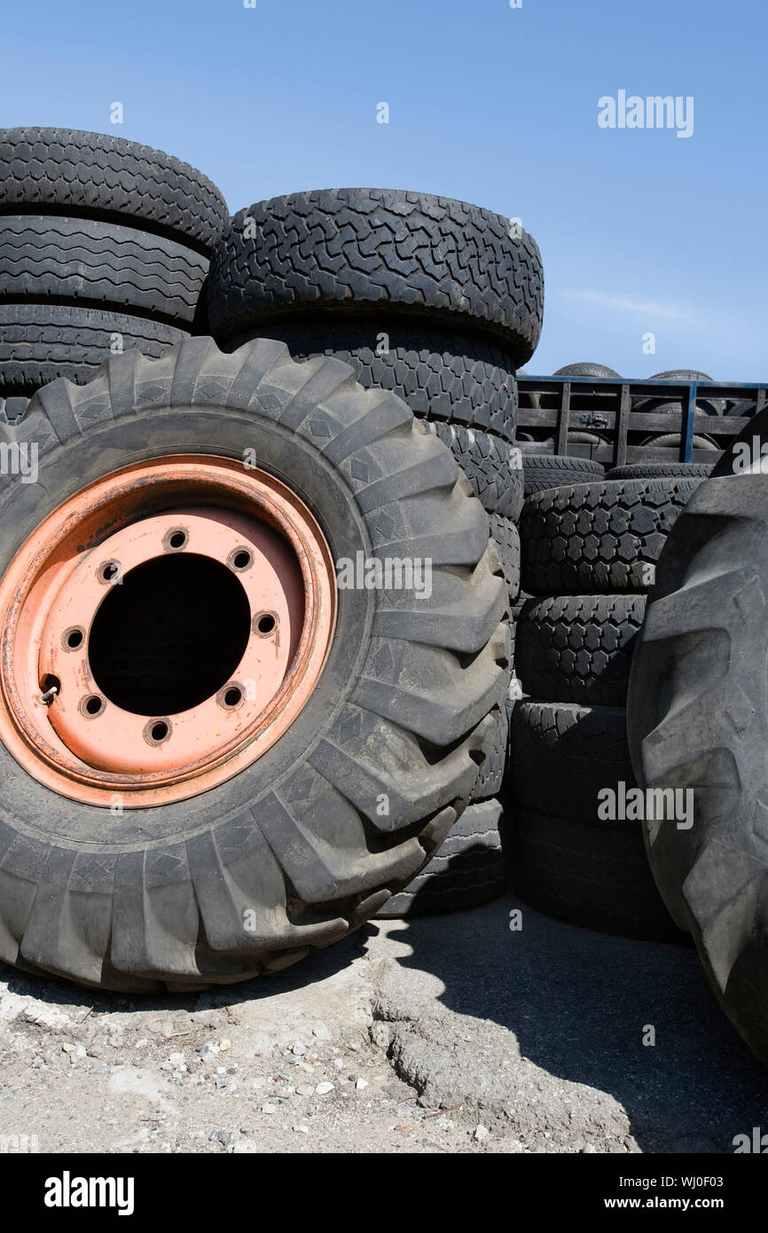 Old tires in recycling centre Stock Photo - Alamy