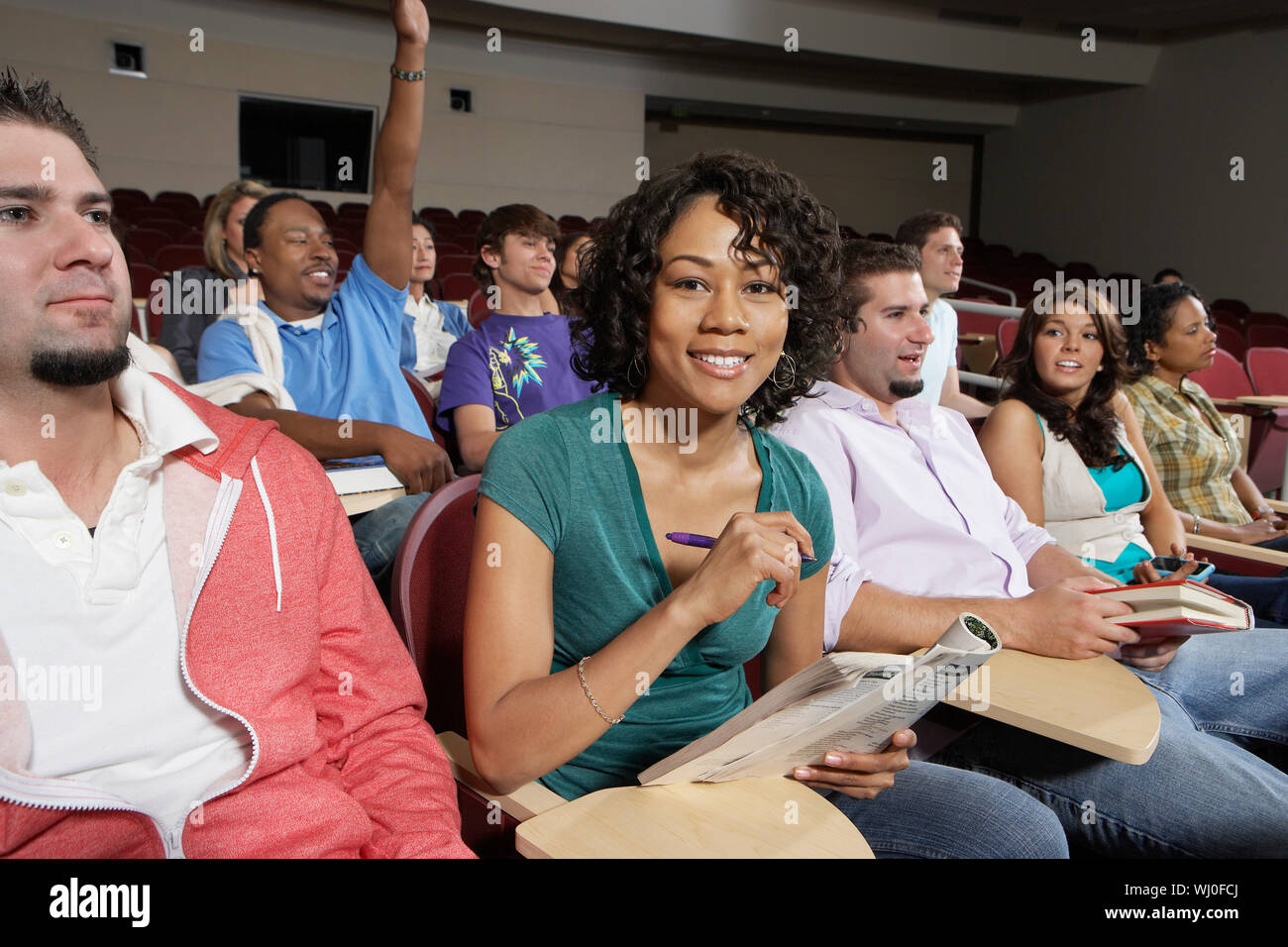 Female student sitting in class, portrait Stock Photo - Alamy
