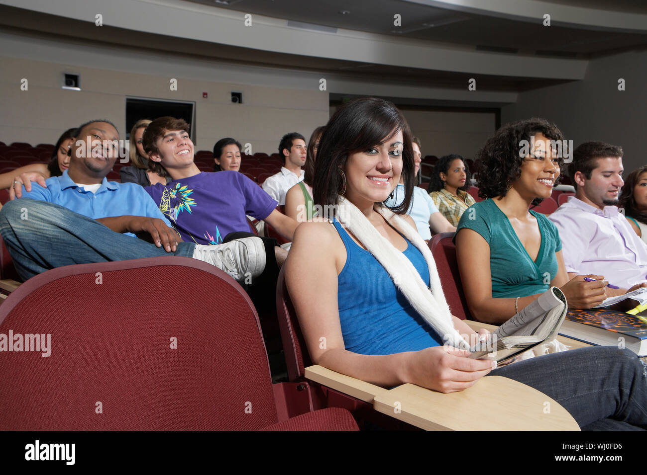 Female student sitting in class, portrait Stock Photo - Alamy