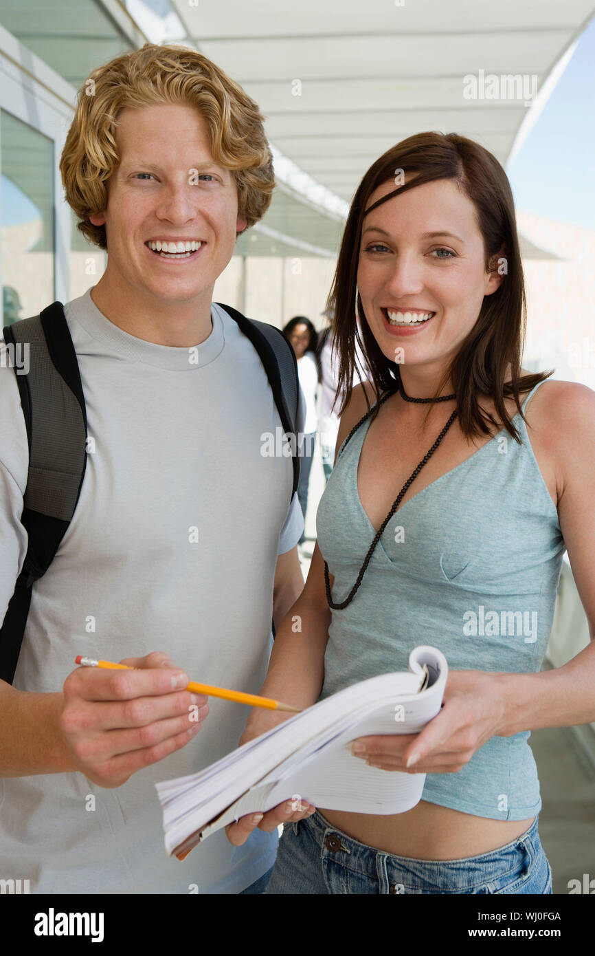 Two students smiling in school, portrait Stock Photo - Alamy