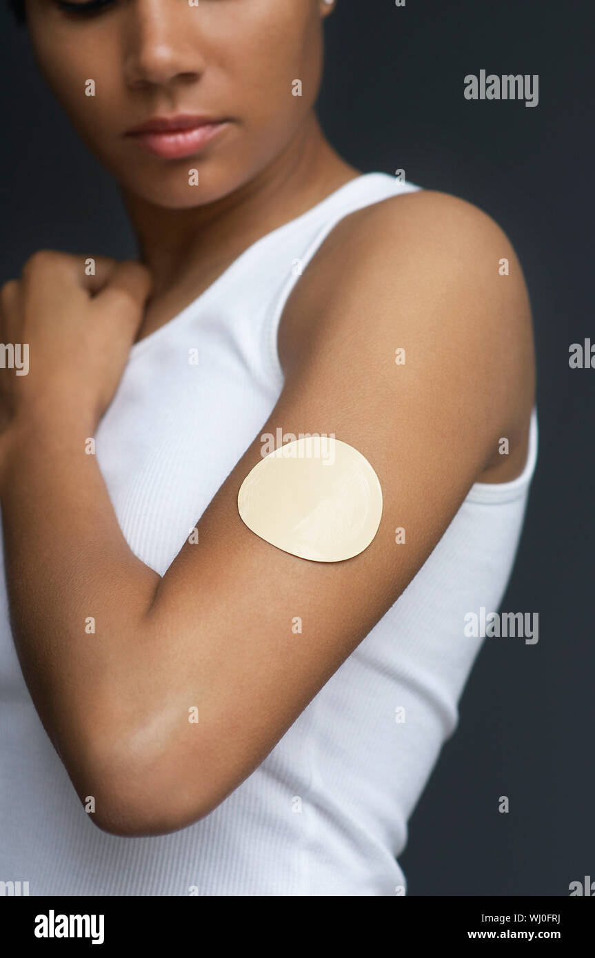 Arm bandaid woman hi-res stock photography and images - Alamy