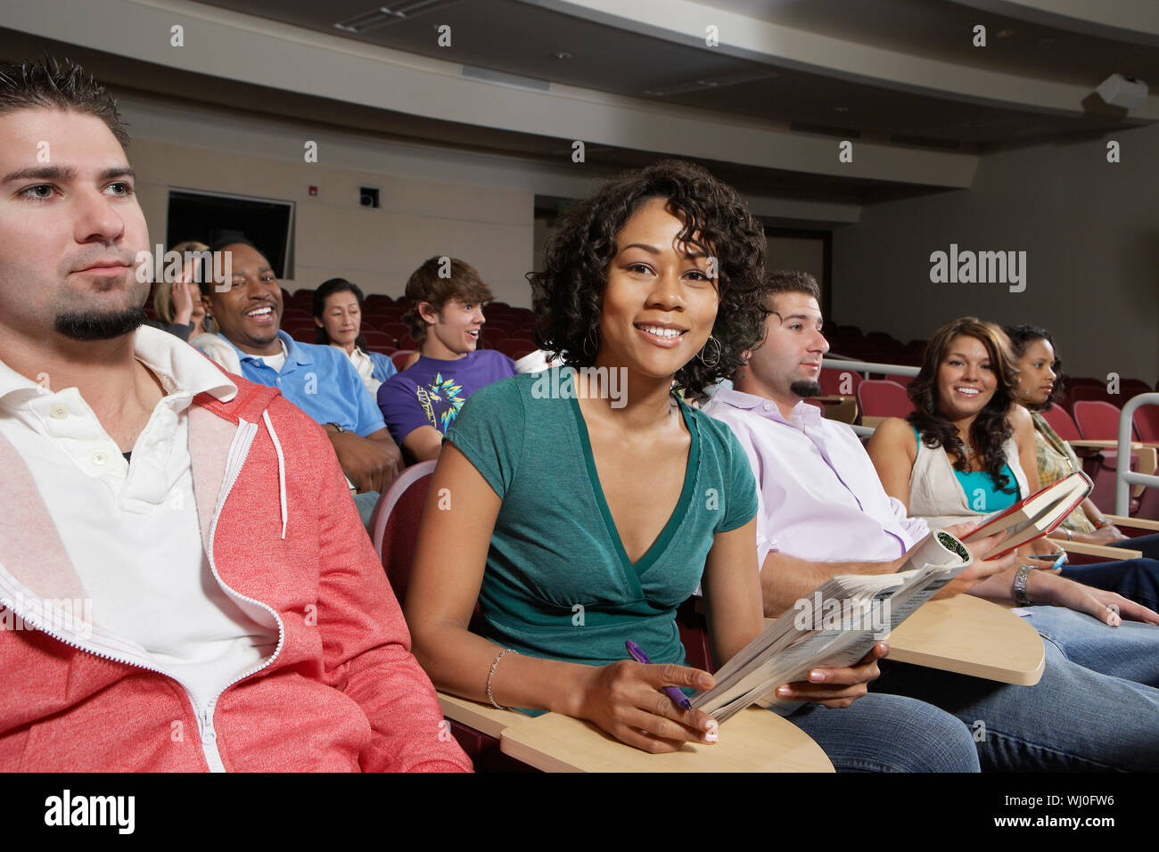Female student sitting in class, portrait Stock Photo - Alamy