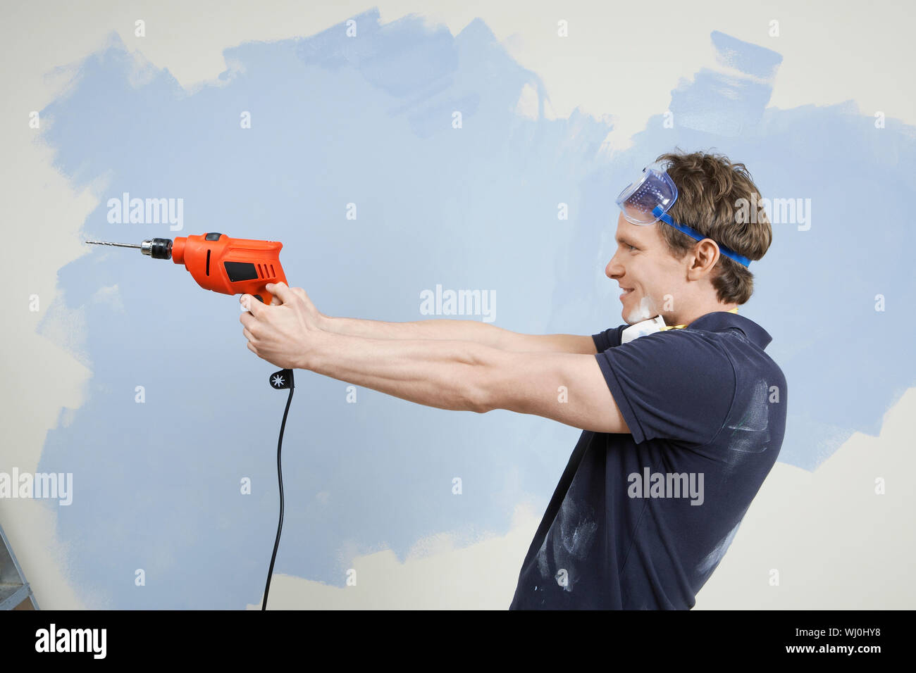 Side profile man holding gun hi-res stock photography and images - Alamy