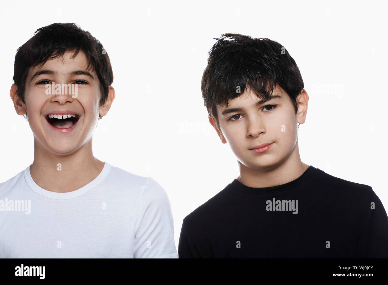 Closeup portrait of confident preadolescent boy with happy brother ...