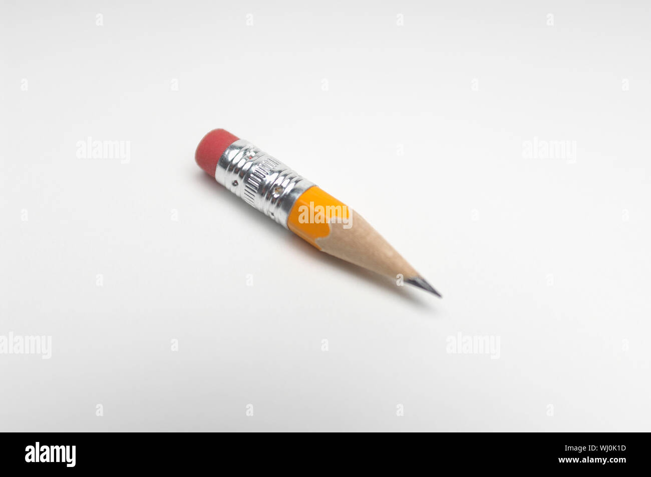 Small pencil on white background Stock Photo - Alamy