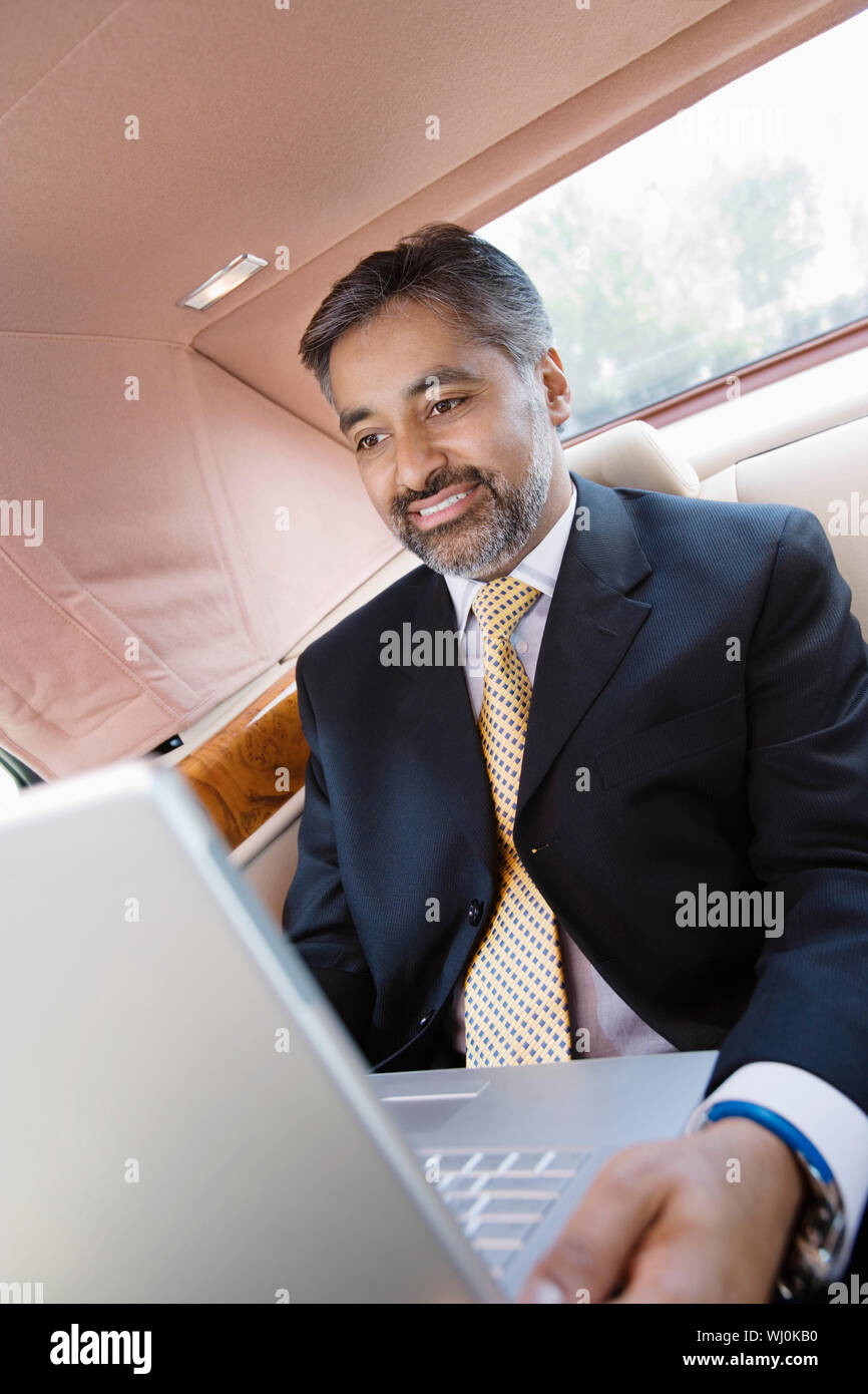 Indian man 50s business suit hi-res stock photography and images - Alamy