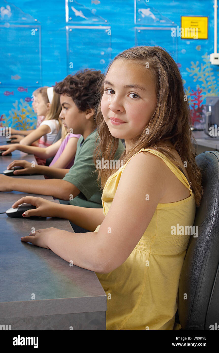 School children using computers in classroom Stock Photo - Alamy