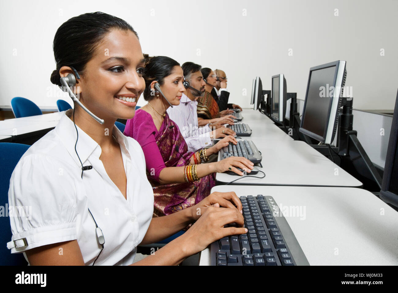Customer Service Reps in Call Center Stock Photo - Alamy